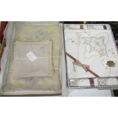 Two boxed vintage table linen sets