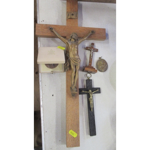 Three crucifix's and two medals