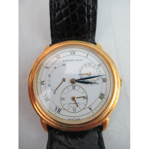 An 18k yellow gold Audemar Piguet duel time zone automatic Wrist Watch ...