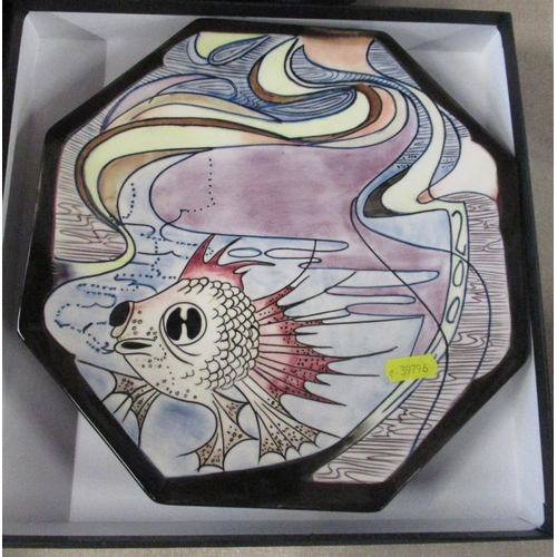 A Black Ryden octagonal plate, decorated with a fish by Bossons ...