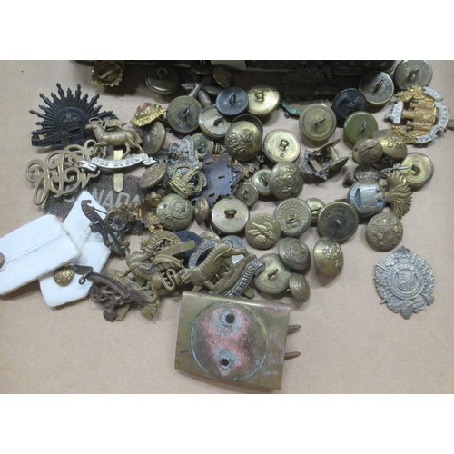 A collection of Military badges, button etc