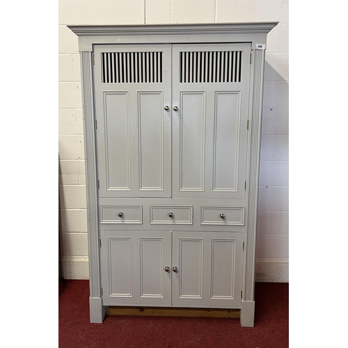 A good antique pine free standing larder, finished in grey ...