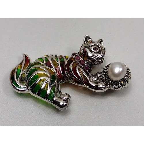 Silver and enamel cat brooch. Shipping Group (A).