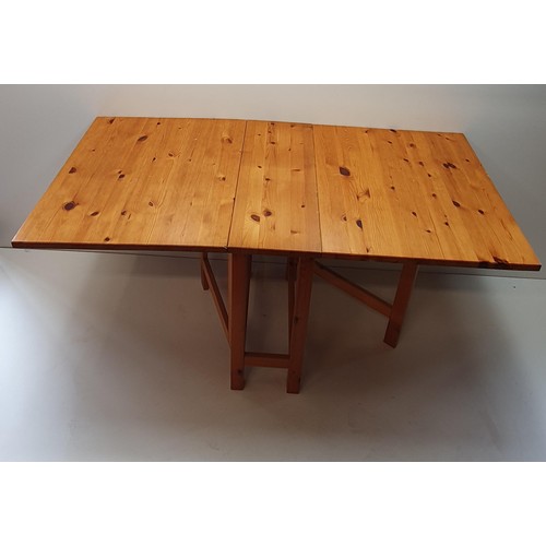 Pine drop-leaf kitchen table.