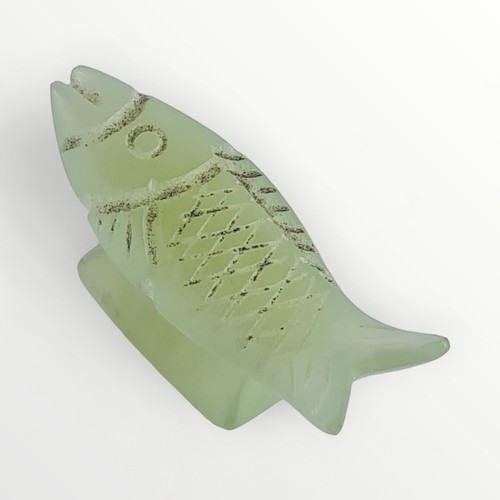 Hand-carved jade fish, measuring 5cm in length. Shipping group (A).