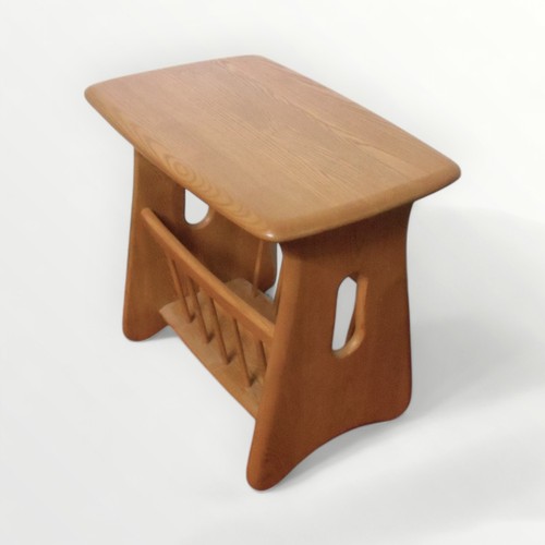 Ercol Windsor elm occasional table with a magazine rack undertier. 50 x ...