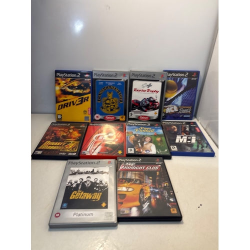 10 PlayStation 2 games in original cases.