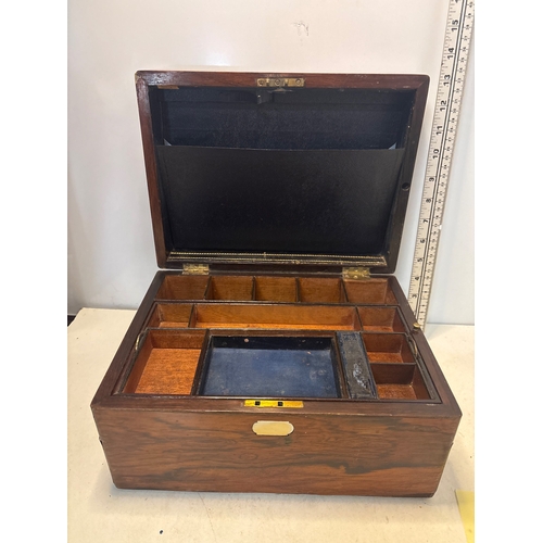 Wooden writing box featuring brass inlays and an engraved plaque ...