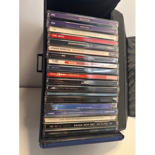 20 assorted music CDs in cases, good condition.