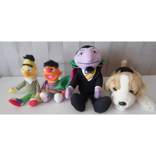 Collection of sesame street plush toys including Count von Count, Bert ...