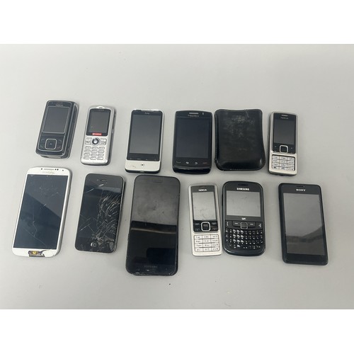 Collection of mobile phones. A Samsung S3350 (also known as Samsung ...