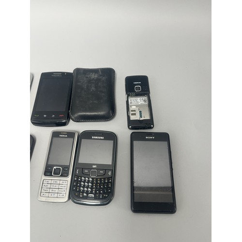 Collection of mobile phones. A Samsung S3350 (also known as Samsung ...