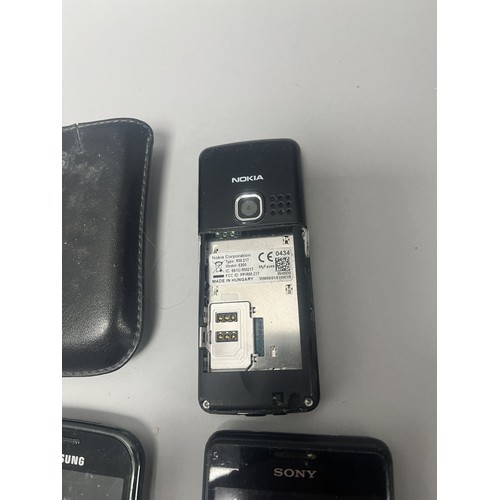 Collection of mobile phones. A Samsung S3350 (also known as Samsung ...