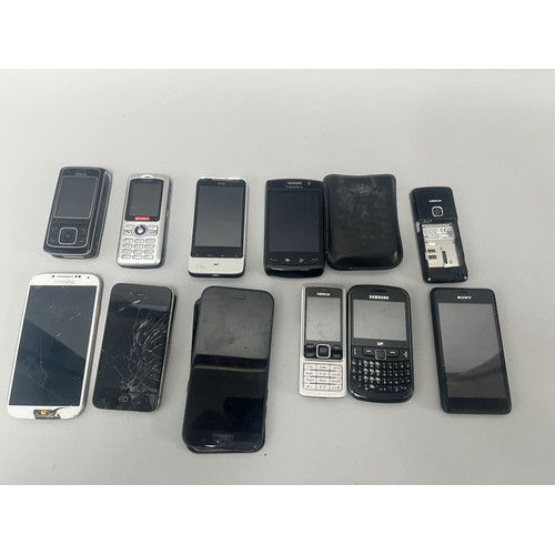 Collection of mobile phones. A Samsung S3350 (also known as Samsung ...