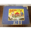 A vintage boxed Bayko building set to include instruction booklet.