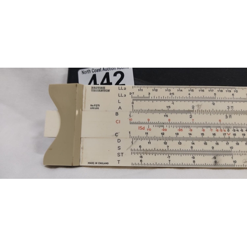 A lot of assorted vintage rulers including a leather cased 12" ruler.