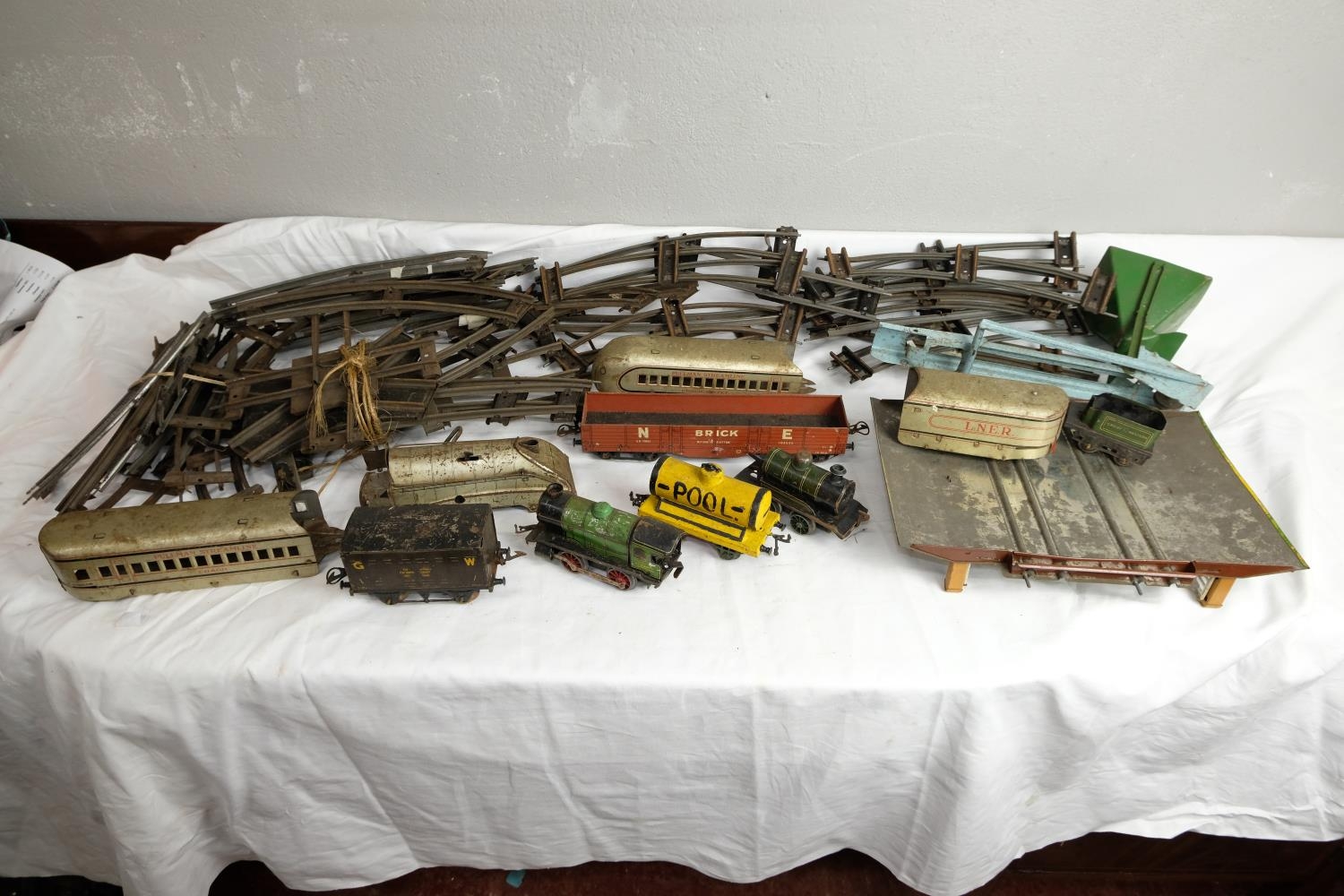 A vintage tin plate train set to include a Pullman Streamline Coach and ...