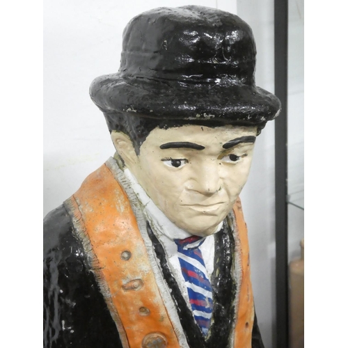 An unusual garden statue of an Orangeman. 102cm tall.