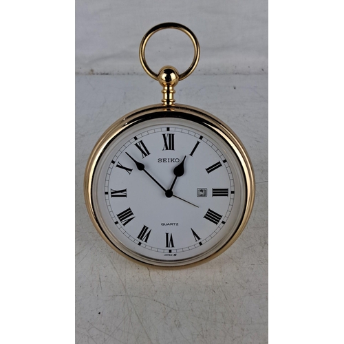 Seiko gold-tone quartz pocket watch with Roman numerals and date window ...