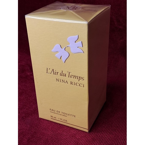 A new unopened bottle of L'Air du Temps perfume.