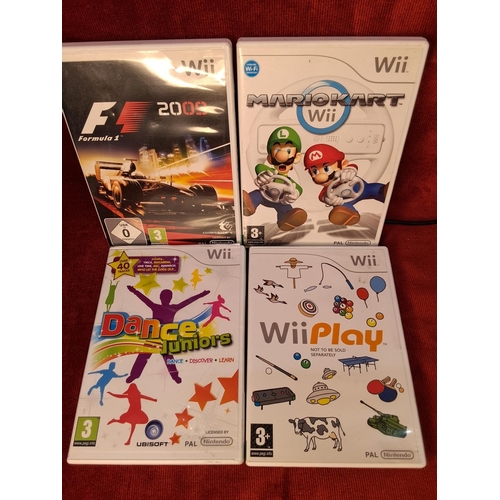 A Nintendo Wii console, foot pedal, games etc.
