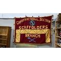 A large vintage handmade union banner, featuring bold red and yellow ...