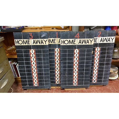 Four vintage wooden score boards.