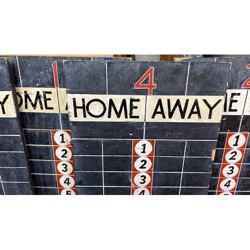 Four vintage wooden score boards.