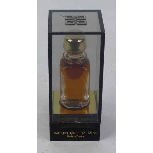A miniature cased Givenchy III perfume.
