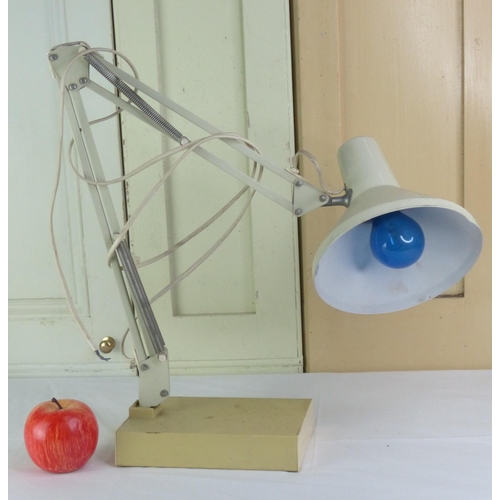 A vintage angle poise lamp.