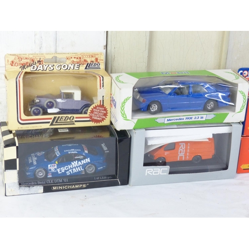 A collection of boxed model cars, to include Corgi, Minichamps, Lledo ...