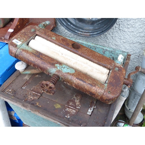 A vintage mangle/washing machine for restoration.