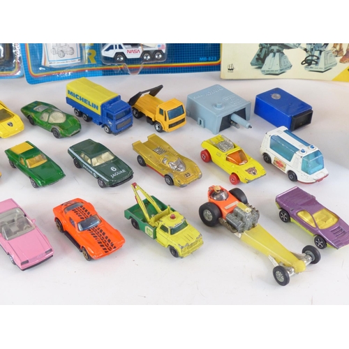 A collection of Matchbox cars, a Star Wars story book and more.