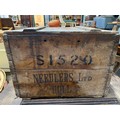 An antique wooden bottle crate 'Needlers Ltd, Hull'.