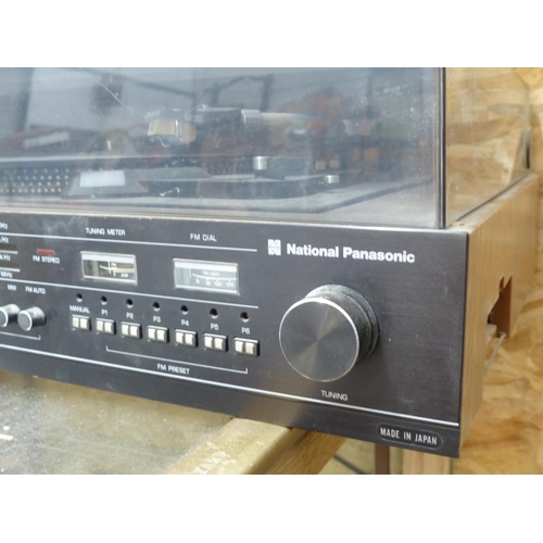 A vintage National Panasonic music centre with speakers.