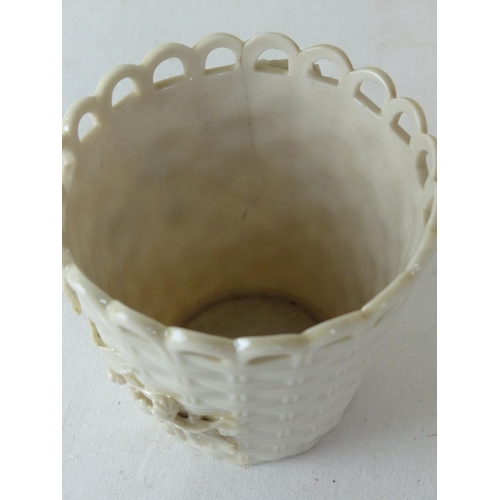 An early Belleek pottery 'Black' stamp flower encrusted vase.