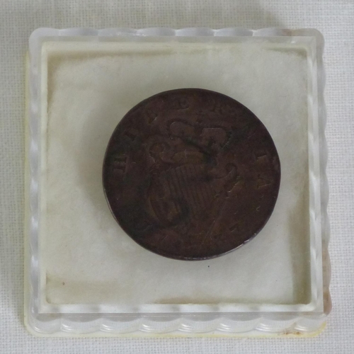 An antique 1769 George III Irish Hibernia half penny coin.