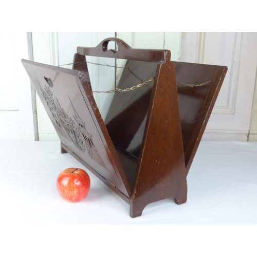 An unusual Oriental design folding magazine rack.