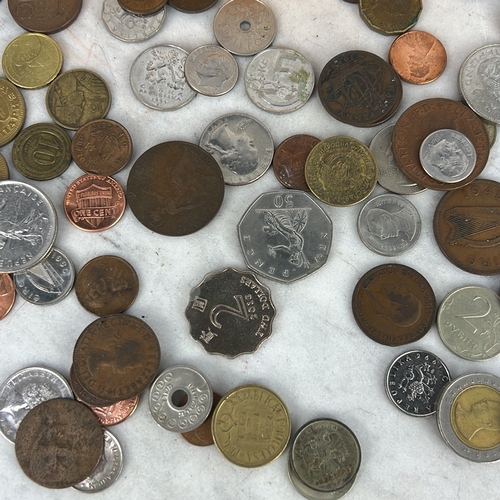 A quantity of mixed world coins, base metal issues in copper, nickel ...
