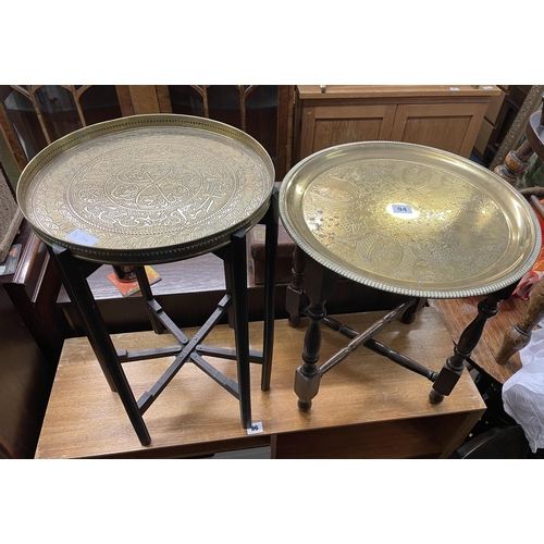 TWO ENGRAVED TRAY TOP TABLES ON FOLDING BASES