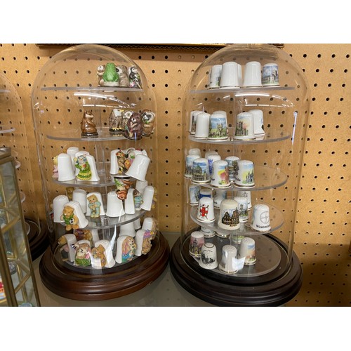 FOUR GLASS DOMED DISPLAY CASES CONTAINING THIMBLES DEPICTING BIRDS OF ...
