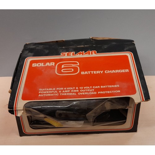 BOX CONTAINING STAINLESS STEEL FLASK, BATTERY CHARGER, AND VARIOUS ...