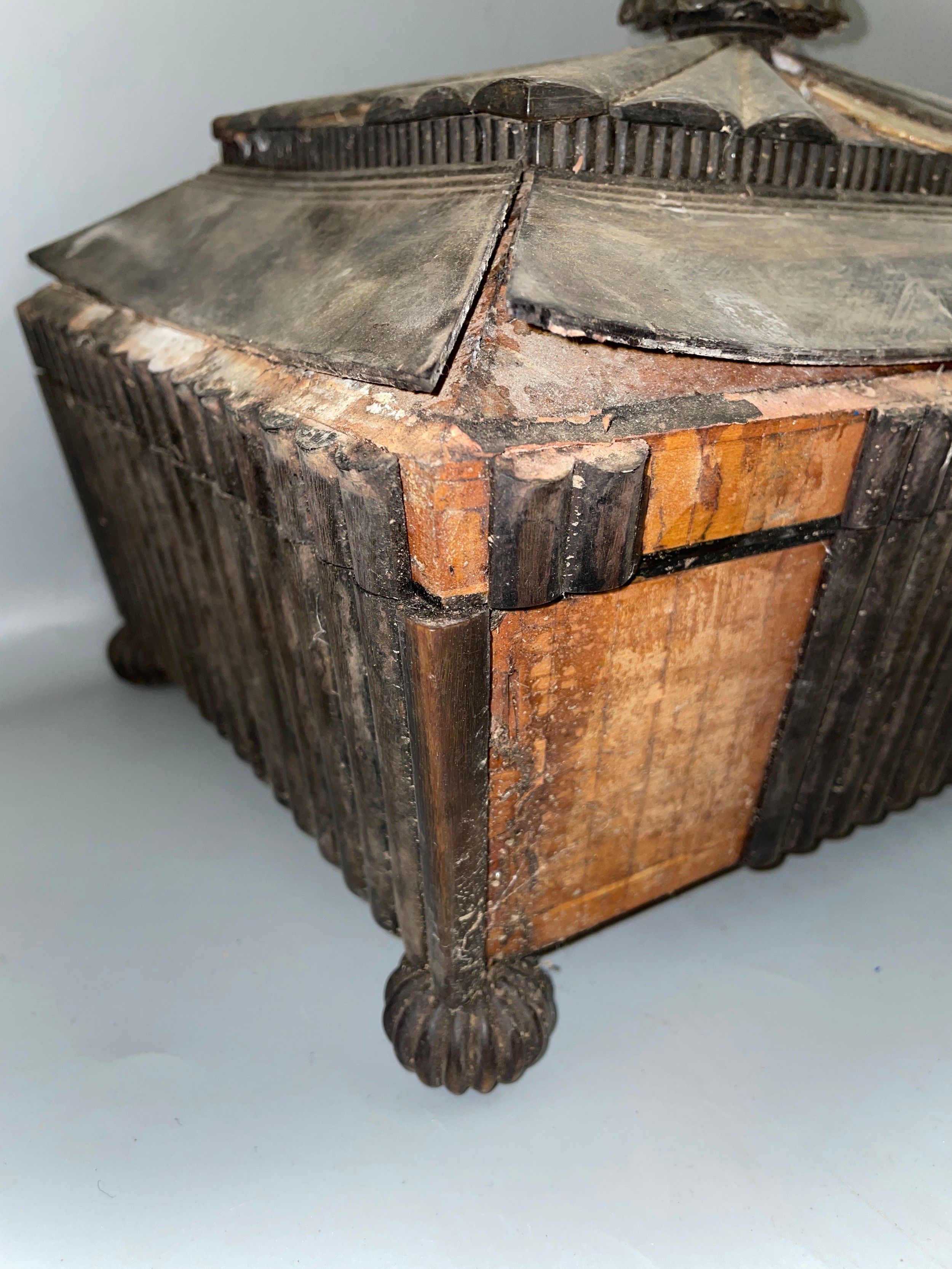 DISTRESSED ANGLO INDIAN SARCOPHAGUS SHAPED BOX