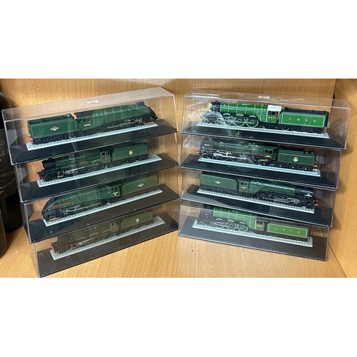 EIGHT LOCOMOTIVE TRAIN MODELS IN PERSPEX BOXES