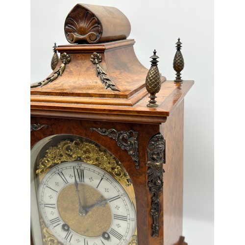 BURR WALNUT CASED CHIMING MANTEL CLOCK WITH GILT METAL MOUNTS AND FINIALS
