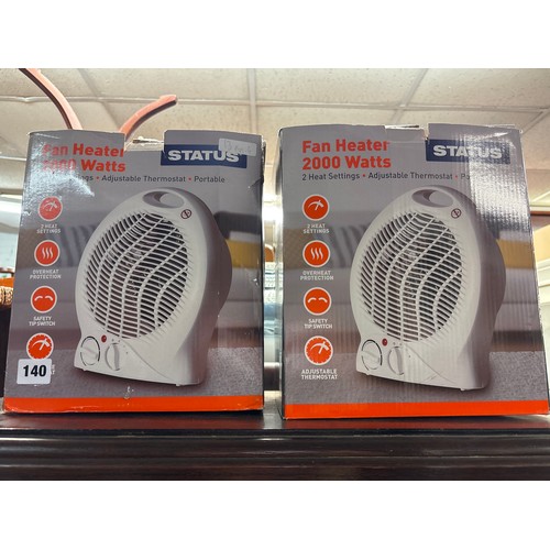TWO STATUS FAN HEATERS