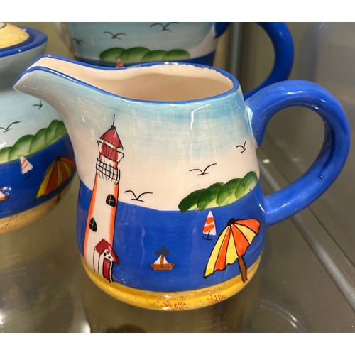 POTTERY NOVELTY SEASIDE TEAPOT AND CANISTERS