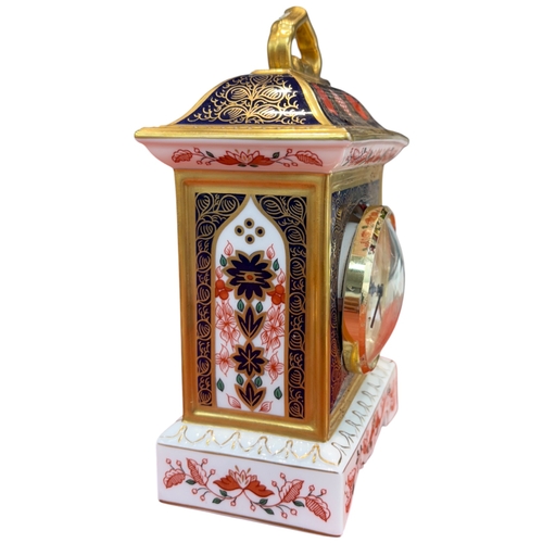 A striking Royal Crown Derby porcelain mantel clock, in the 'Old Imari ...