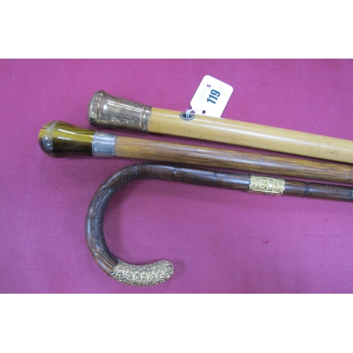 A Tiger Stone Coloured Handled Walking Cane, silver ferrule, steel tip ...