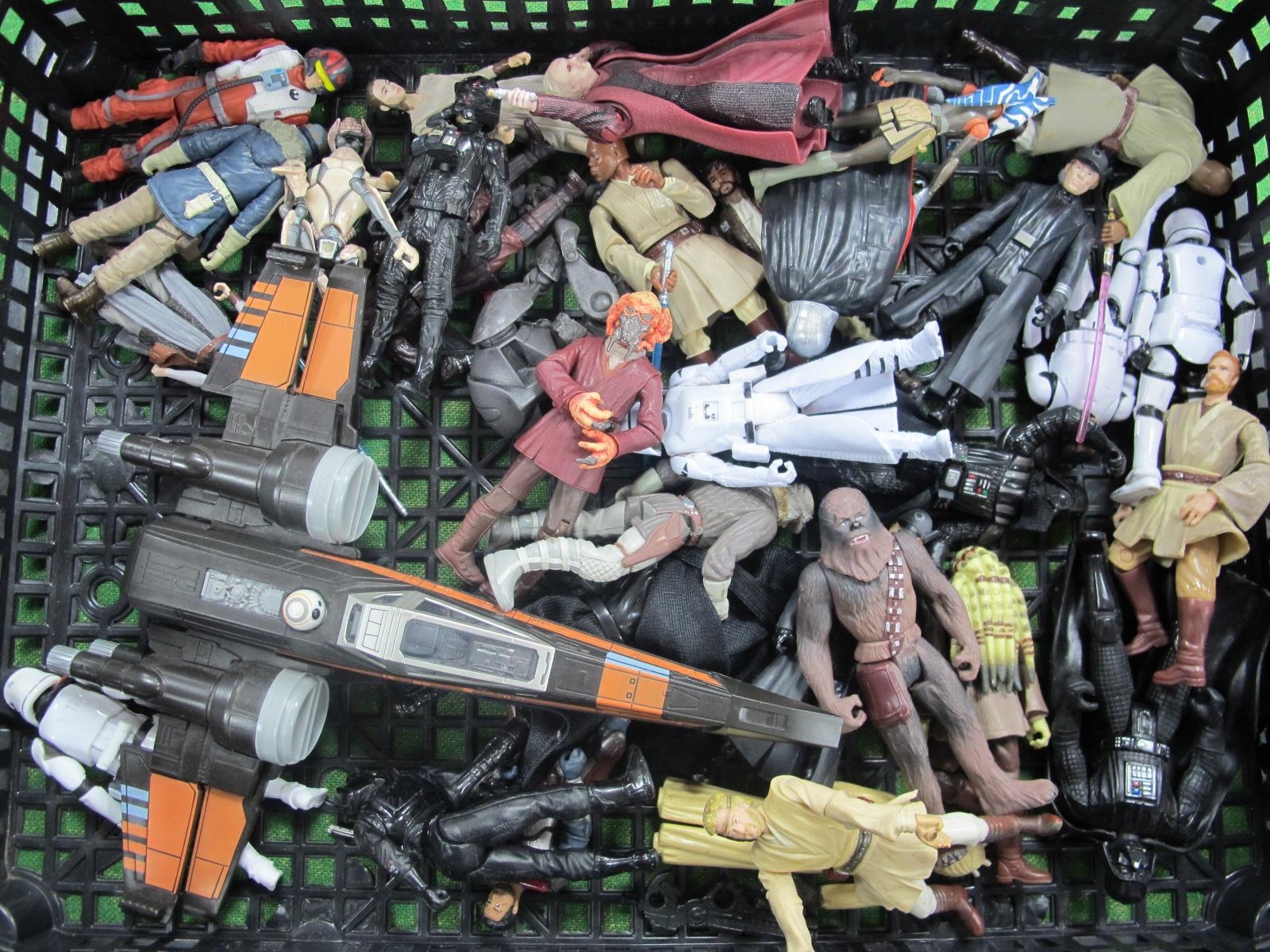 Approximately Twenty Miniature Star Wars Figures and Fighter Ship.
